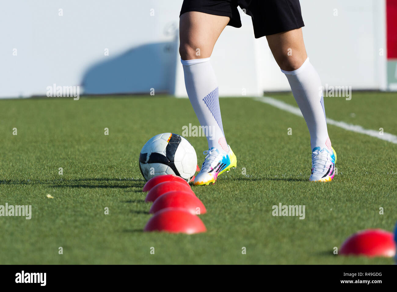 Football player training on the outdoors field Stock Photo - Alamy