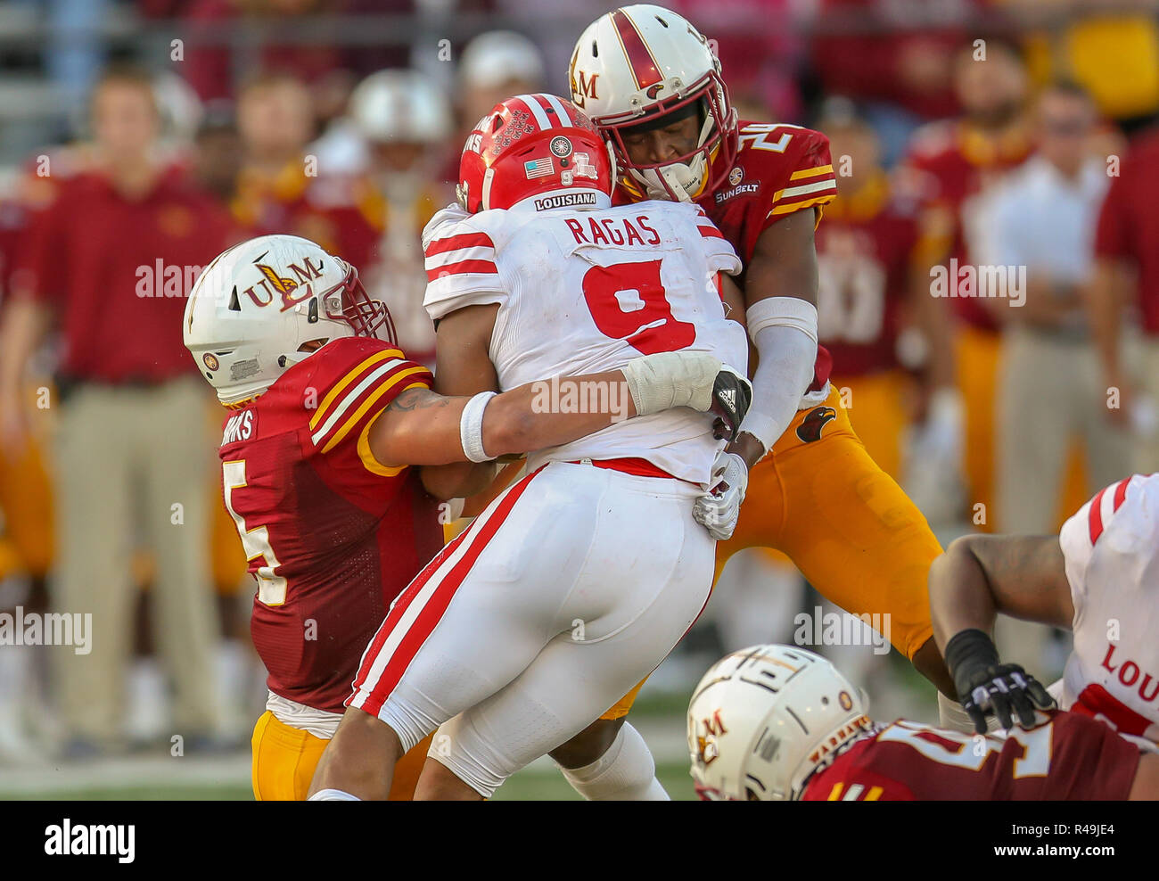 Monroe, Louisiana, USA. 24th Nov, 2018. ULM defenders Jabari Johnson ...
