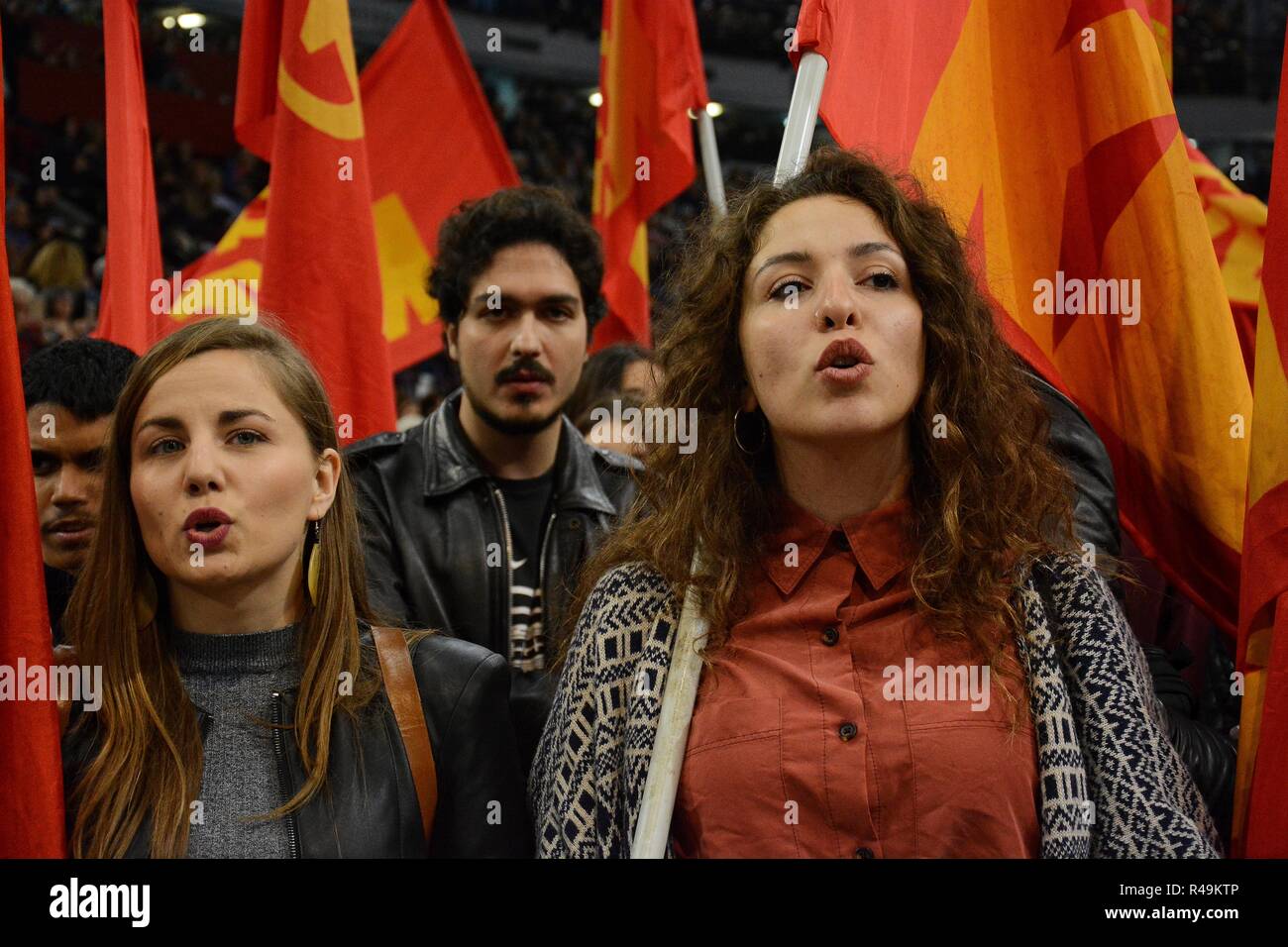 Supporters of the Communist Party seen with flags shouting slogans ...