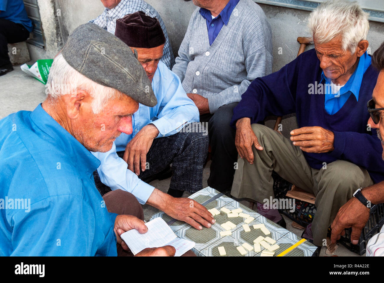 Senior citizens playing dominoes, Tirana, Albania Stock Photo - Alamy