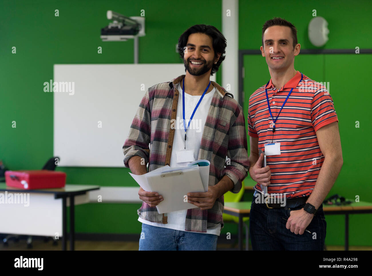 Two Teachers in a Classroom Stock Photo - Alamy