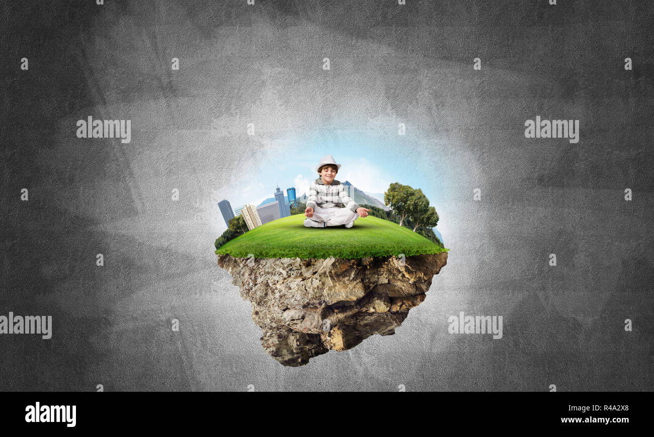 Little boy keeping mind conscious Stock Photo - Alamy