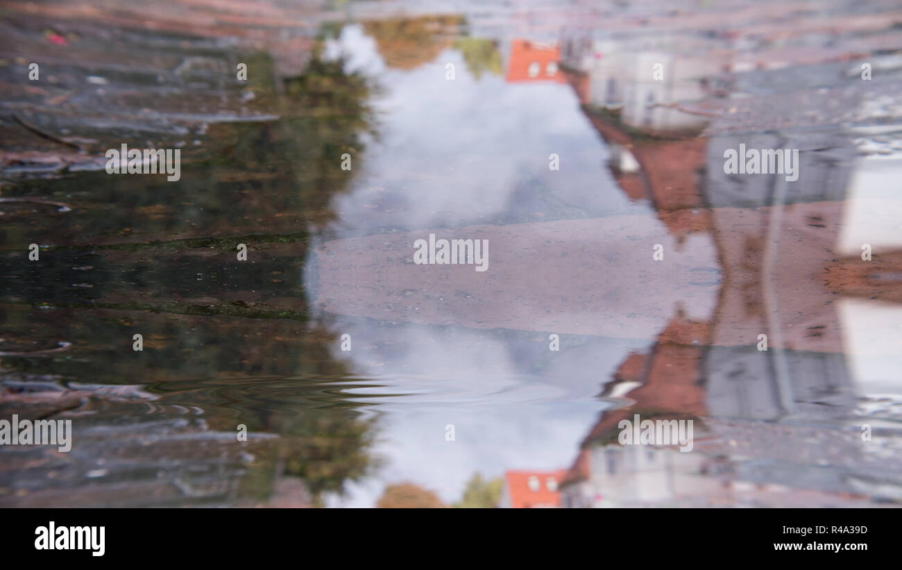 Street puddle water on tile hi-res stock photography and images - Alamy