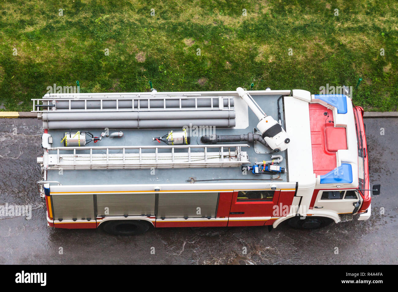 above view of fire engine on wet road Stock Photo - Alamy