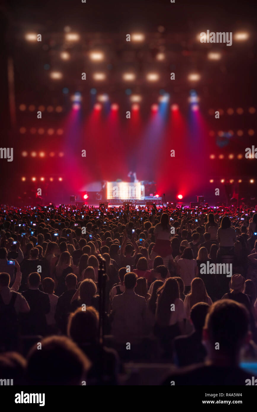 People at the concert are waiting for the show Stock Photo - Alamy