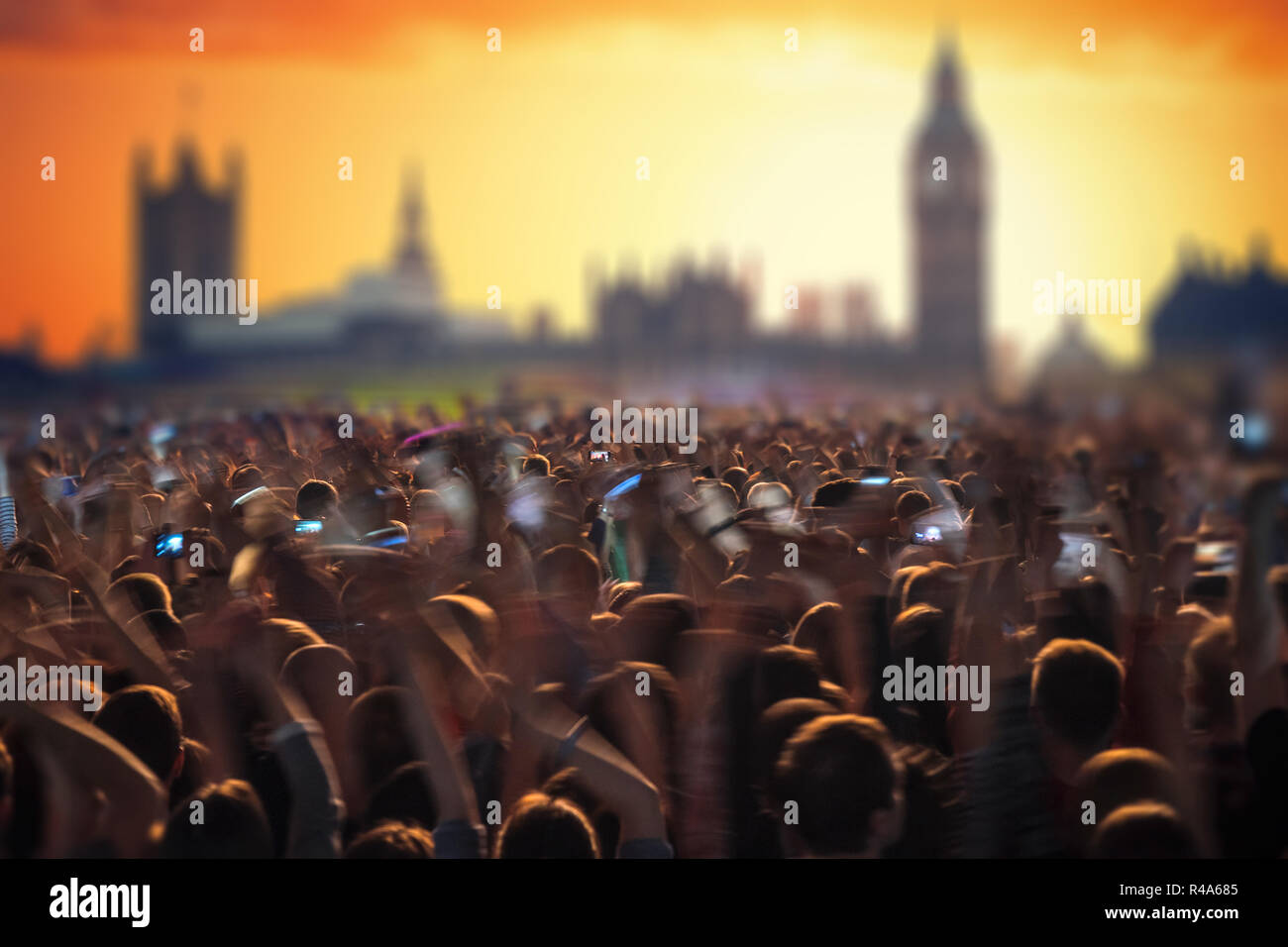 concert on the background of Big Ben , London. A crowd of people ...