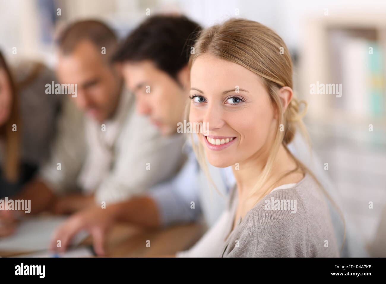 Portrait of beautiful blond girl in class Stock Photo - Alamy