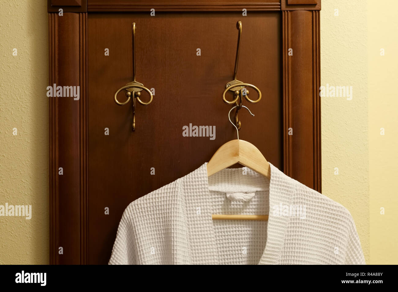 White bedroom robe hi-res stock photography and images - Alamy