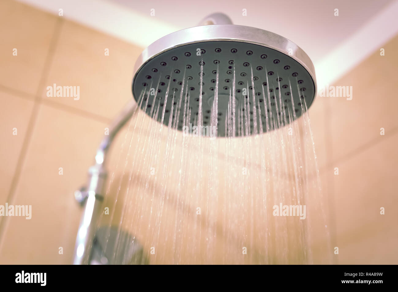 Close up shower head with water flowing flow hi-res stock photography ...