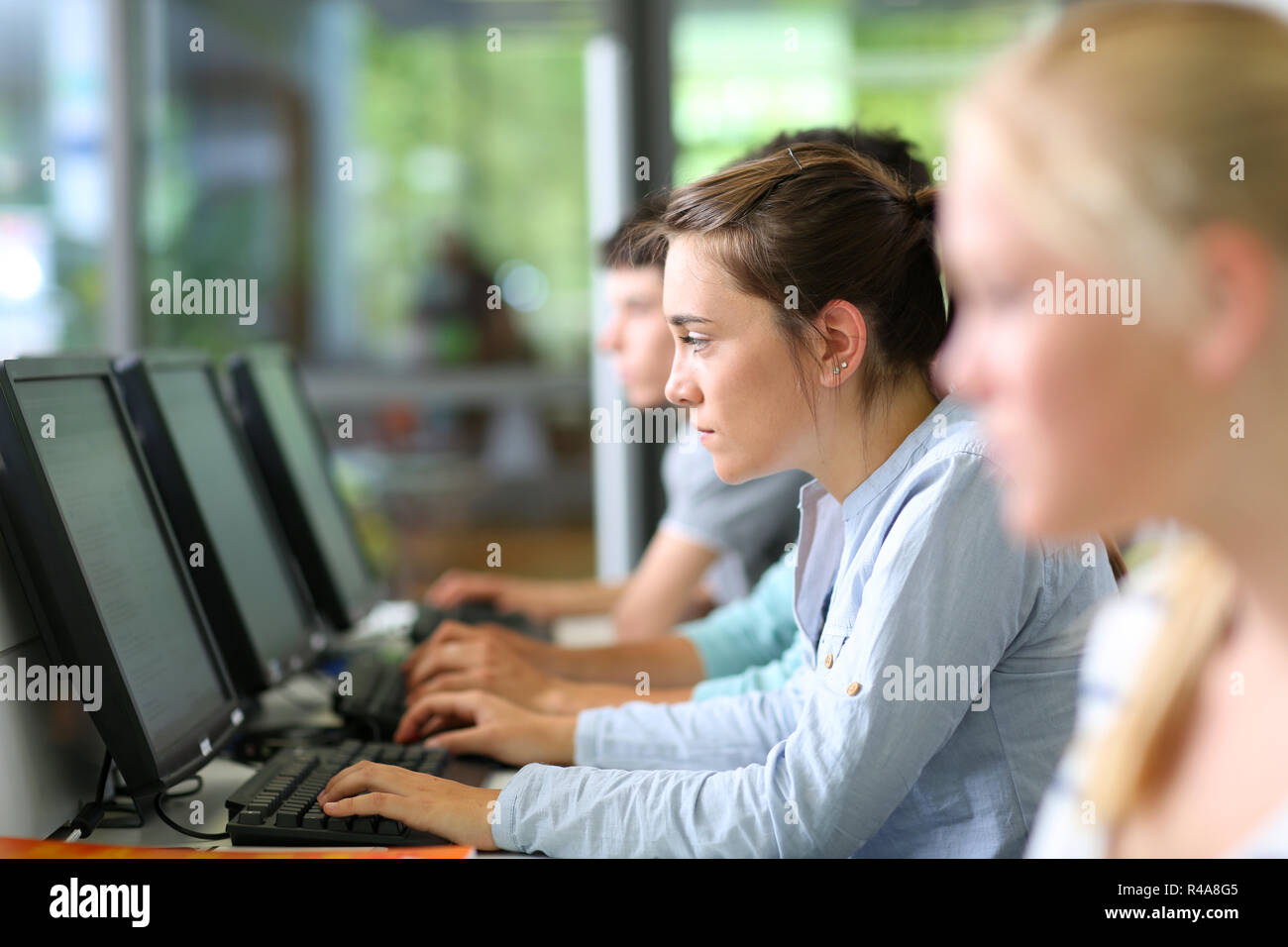 Students in class working on desktop computer Stock Photo - Alamy