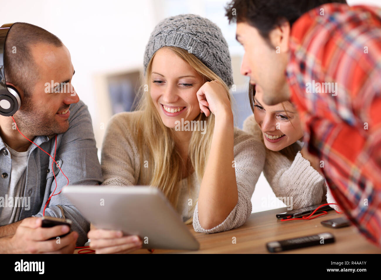 Group of teens using digital technologies Stock Photo - Alamy