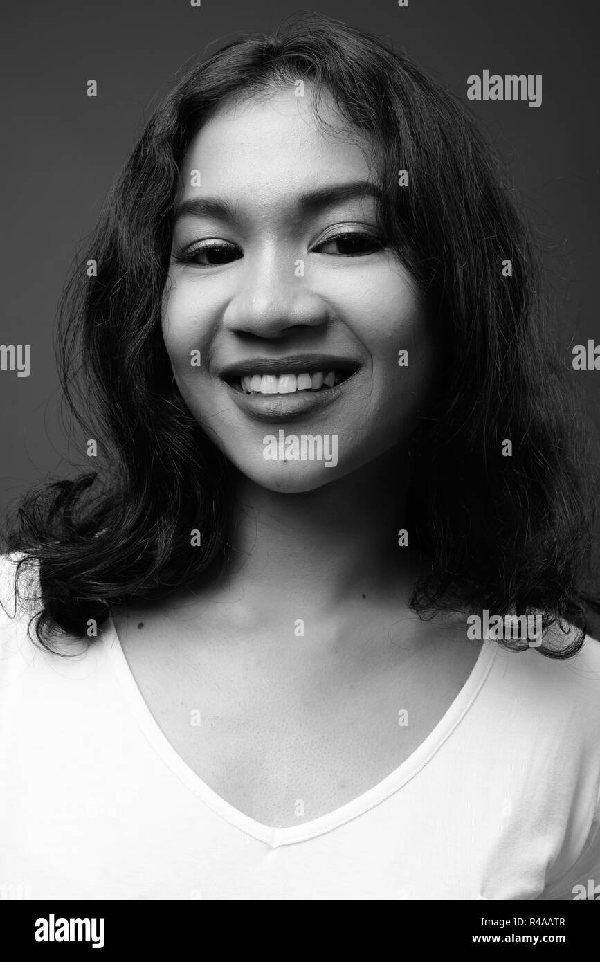 Woman face smiling hi-res stock photography and images - Alamy