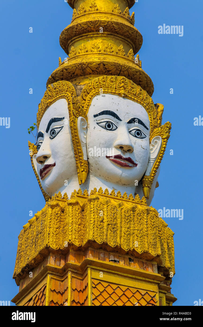 Faces of Hindu creator God Brahma on the Throne Hall's 193 foot golden ...