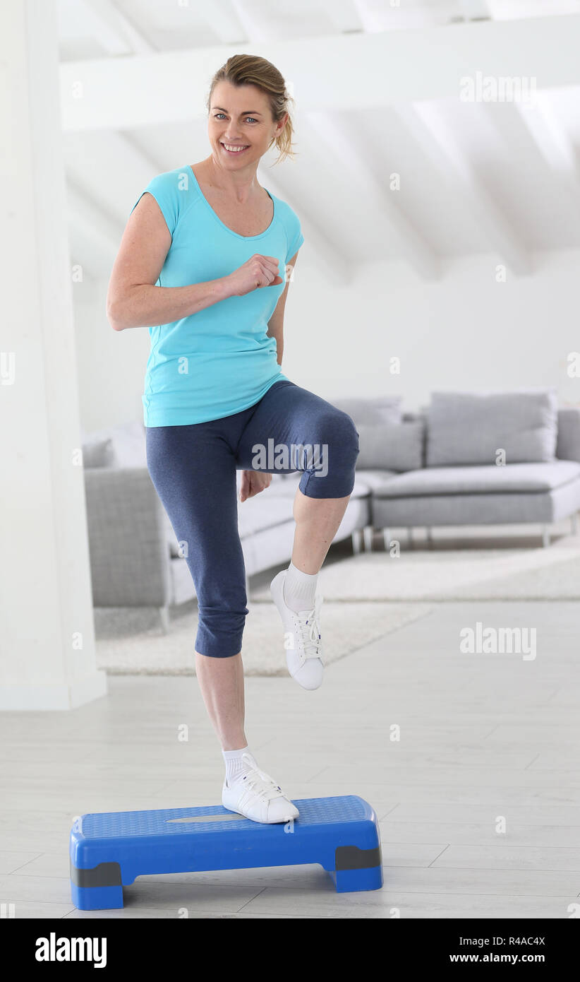 Elder woman step exercise hi-res stock photography and images - Alamy