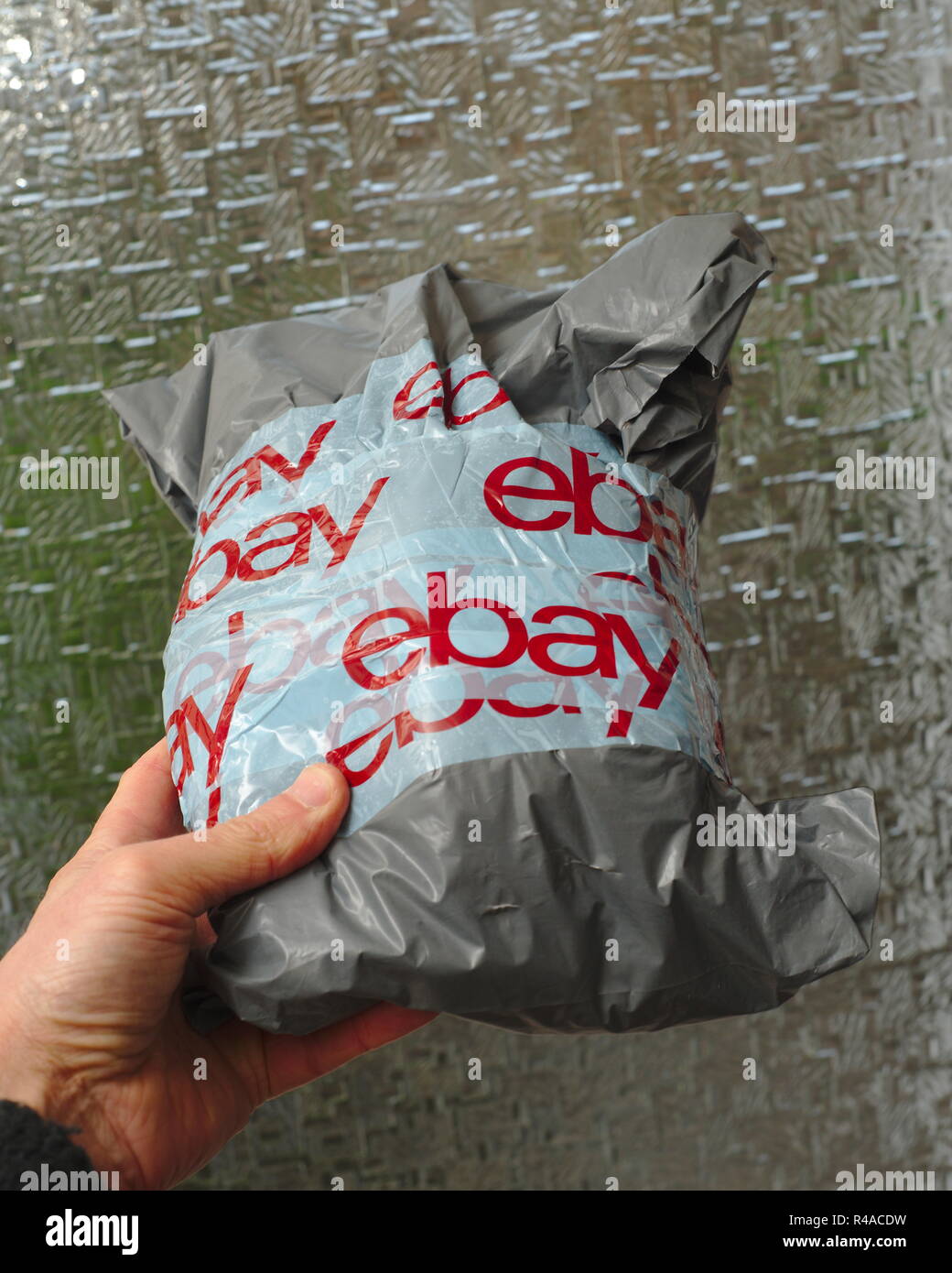 Package wrapped with ebay tape Stock Photo - Alamy