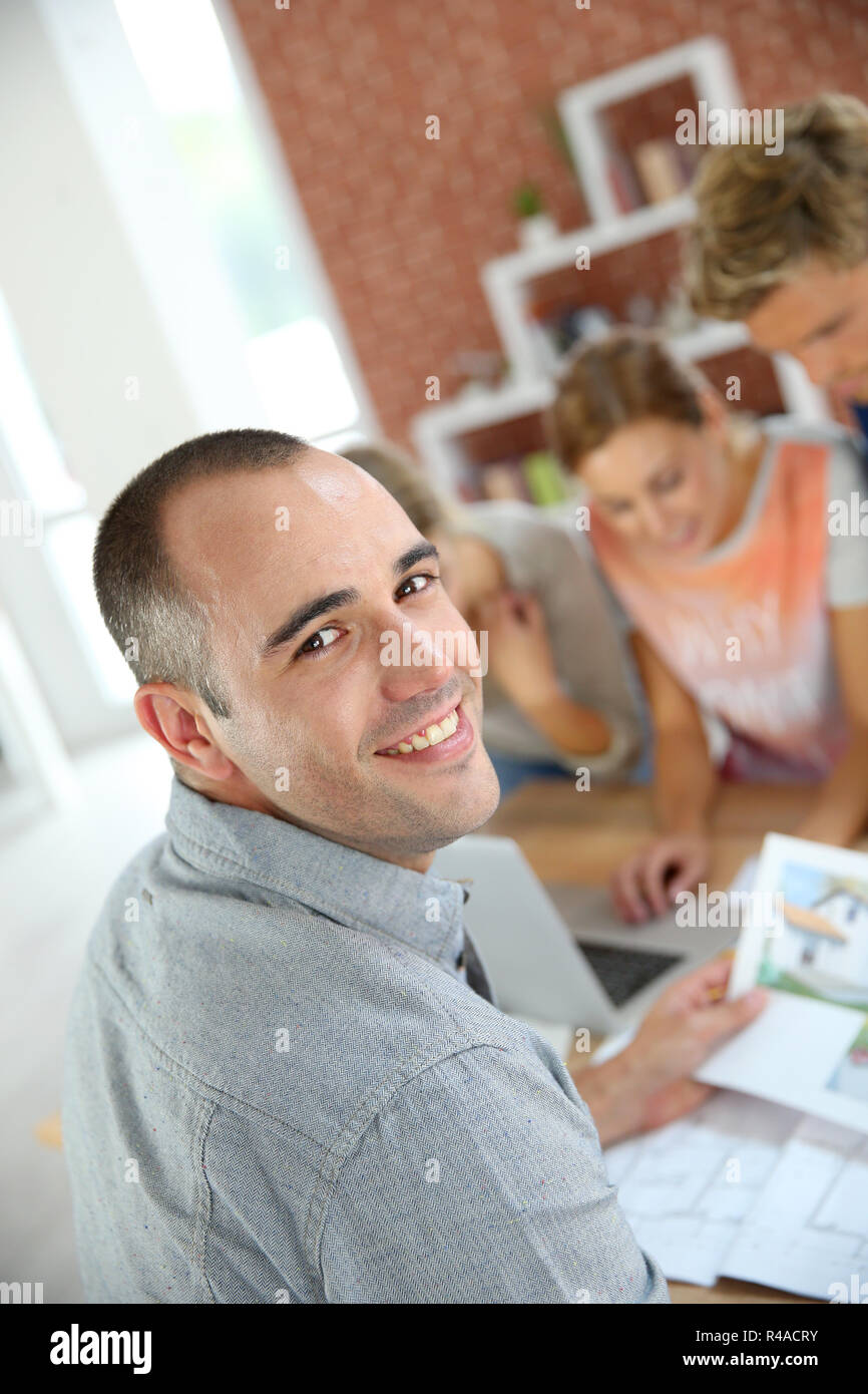 Portrait of smiling college student Stock Photo - Alamy