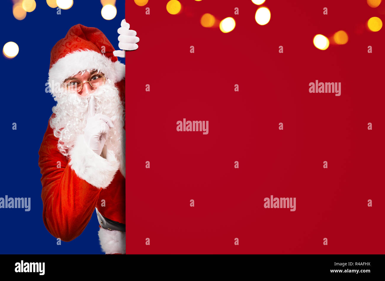 Santa Claus asking for silence Stock Photo - Alamy