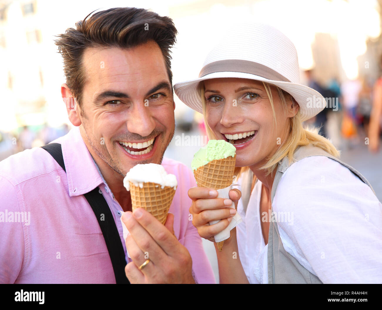 Couple man woman holiday eat ice cream hi-res stock photography and ...