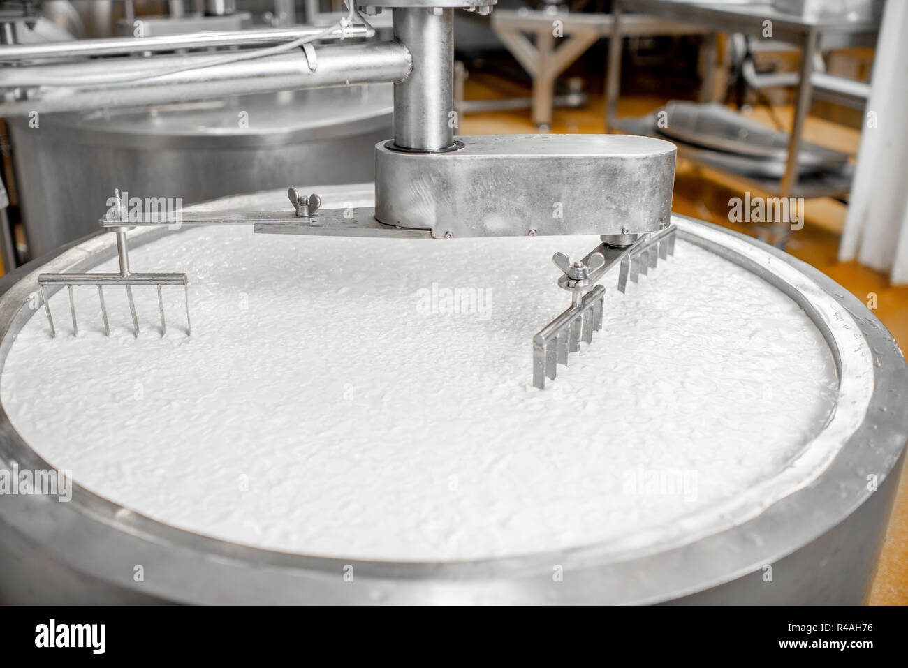 Milk mixing in the stainless tank during the fermentation process at ...
