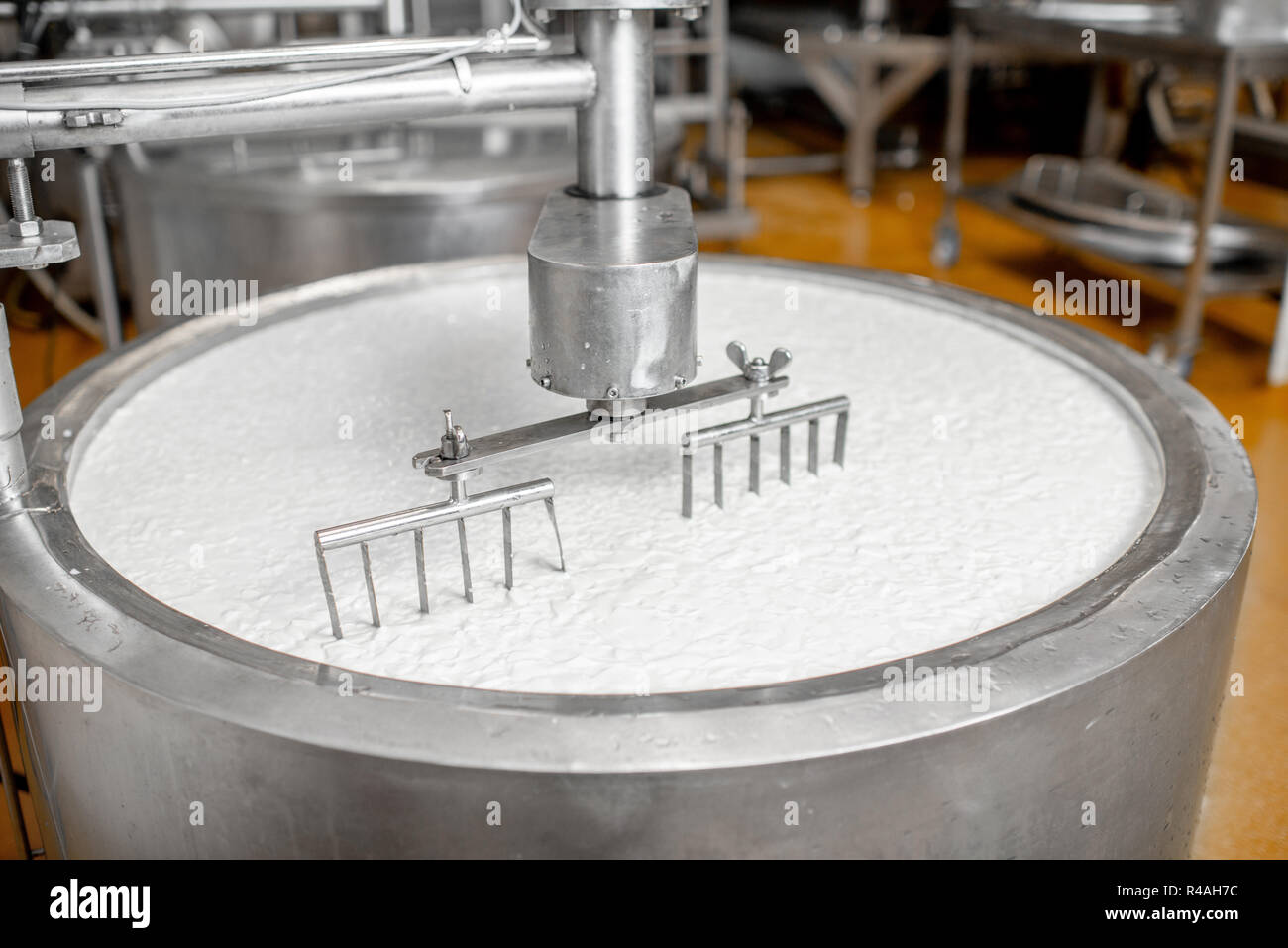 Milk mixing in the stainless tank during the fermentation process at ...