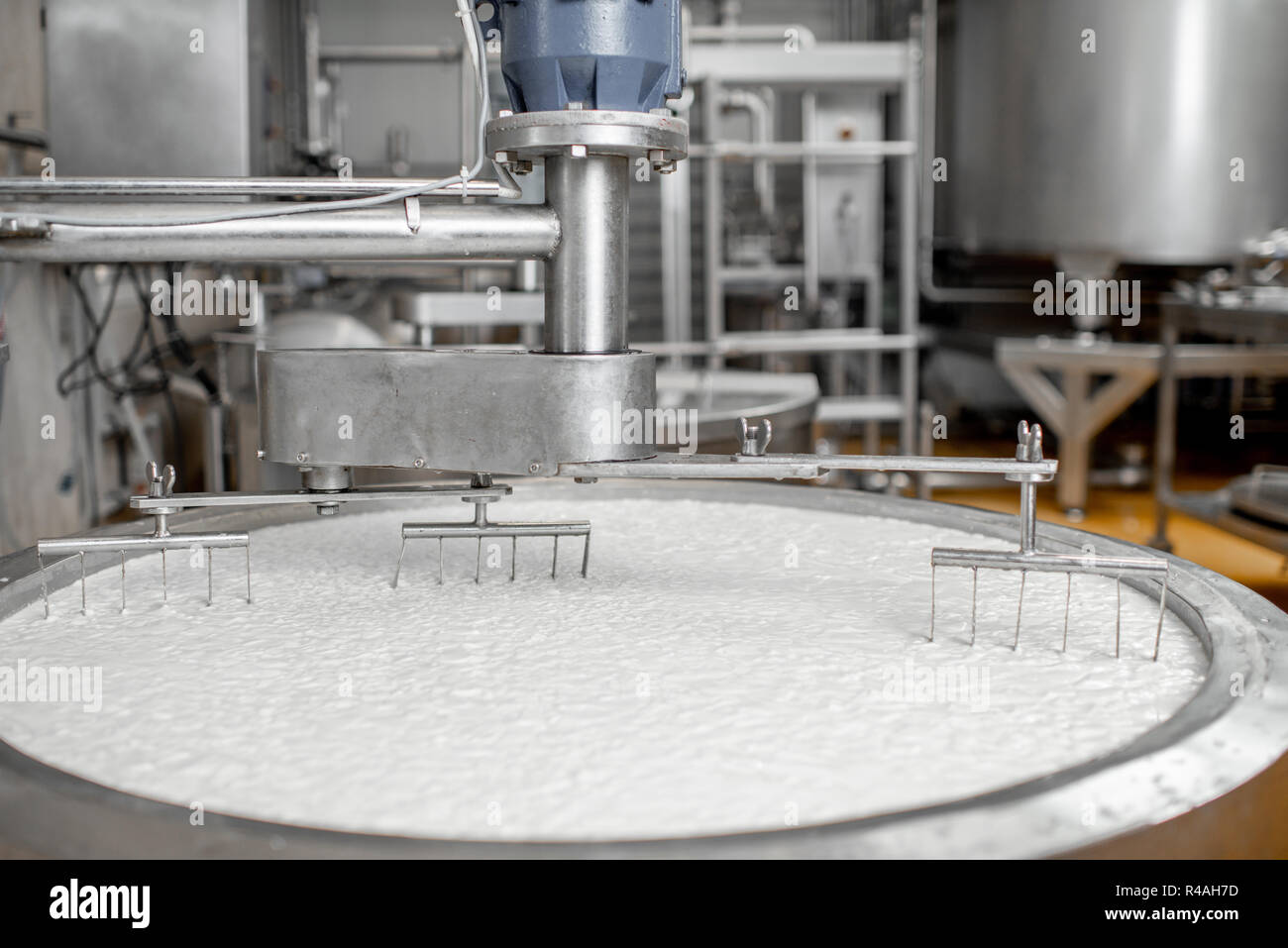 Milk mixing in the stainless tank during the fermentation process at ...