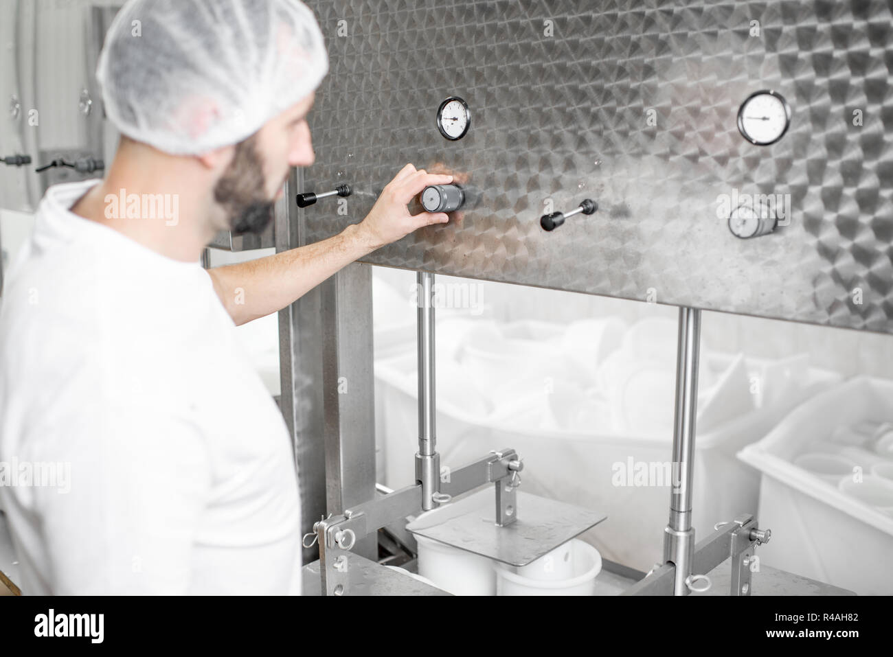 Worker operating press machine hi-res stock photography and images - Alamy