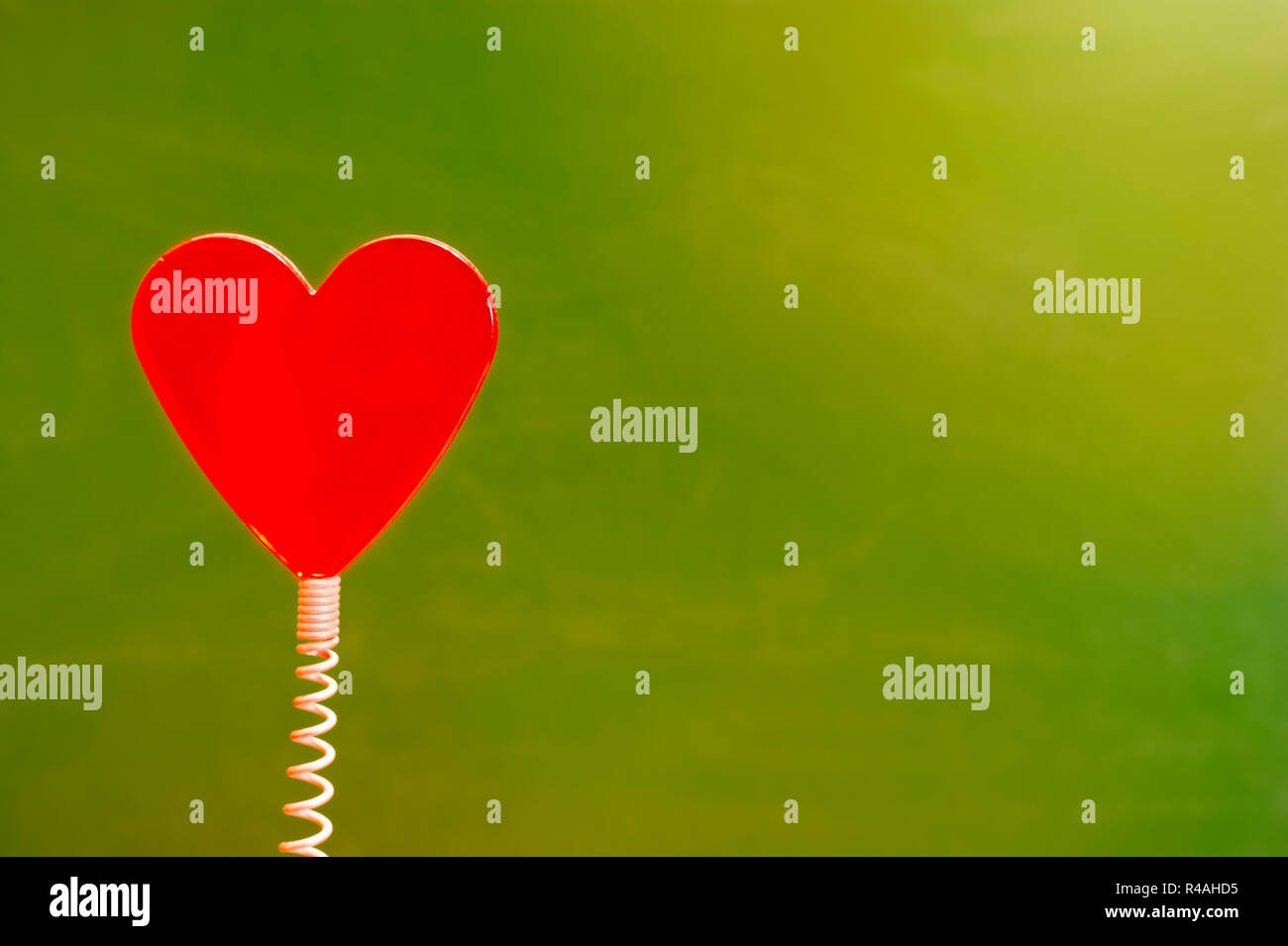 Red Heart On Coil Spring. Green Chalkboard Background. Saint Valentines ...