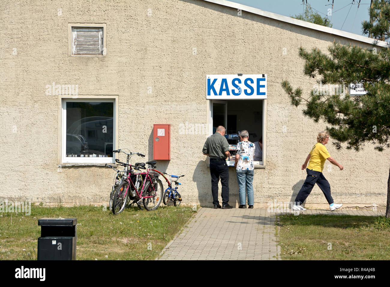 Visitors at the cash register in the disused opencast mine Ferropolis ...