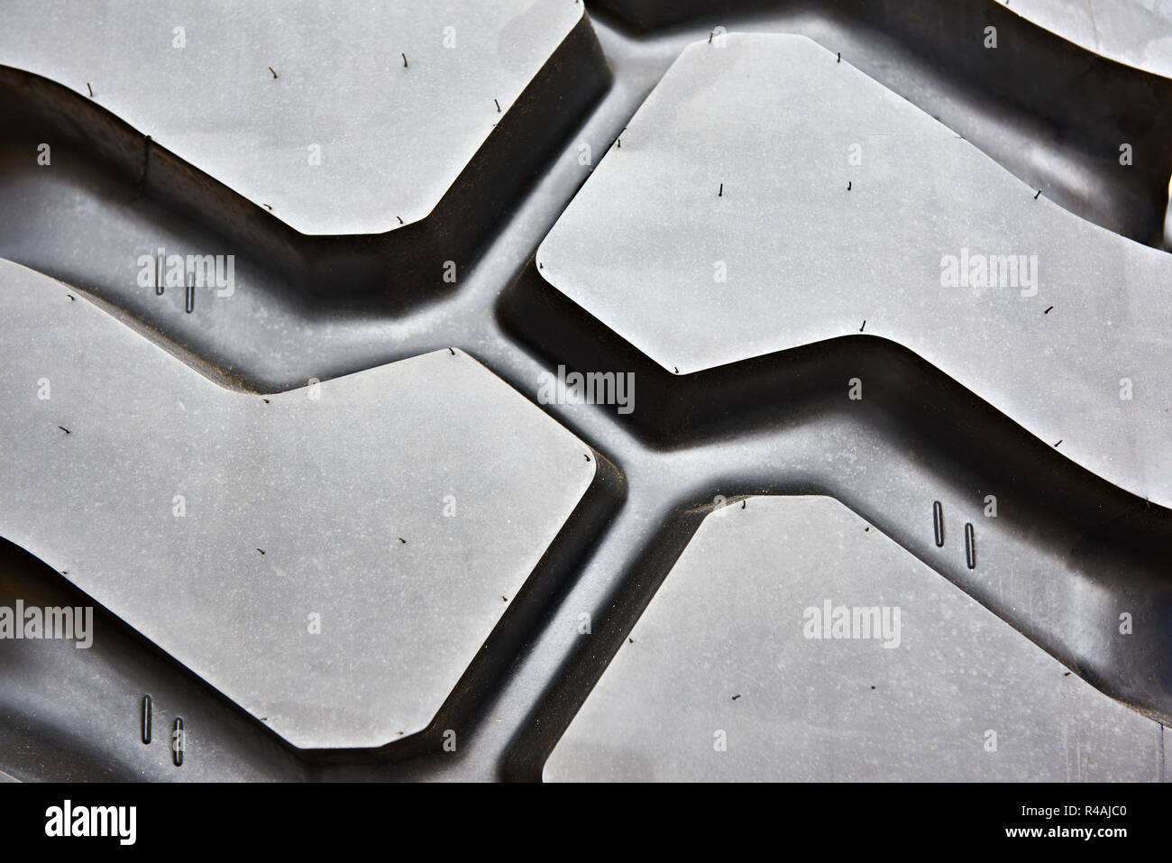 Black rubber tire for tractors and excavator background Stock Photo - Alamy
