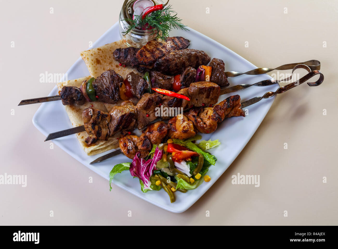 Barbeque meat mix plate with vegetalbes Stock Photo - Alamy