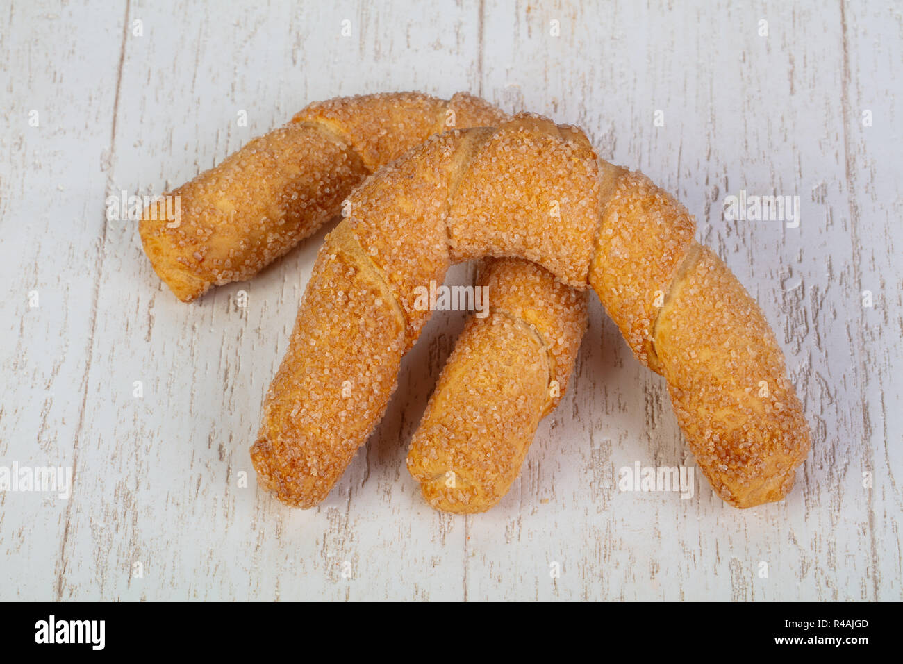 Tasty sugar coated pastry roll Stock Photo - Alamy