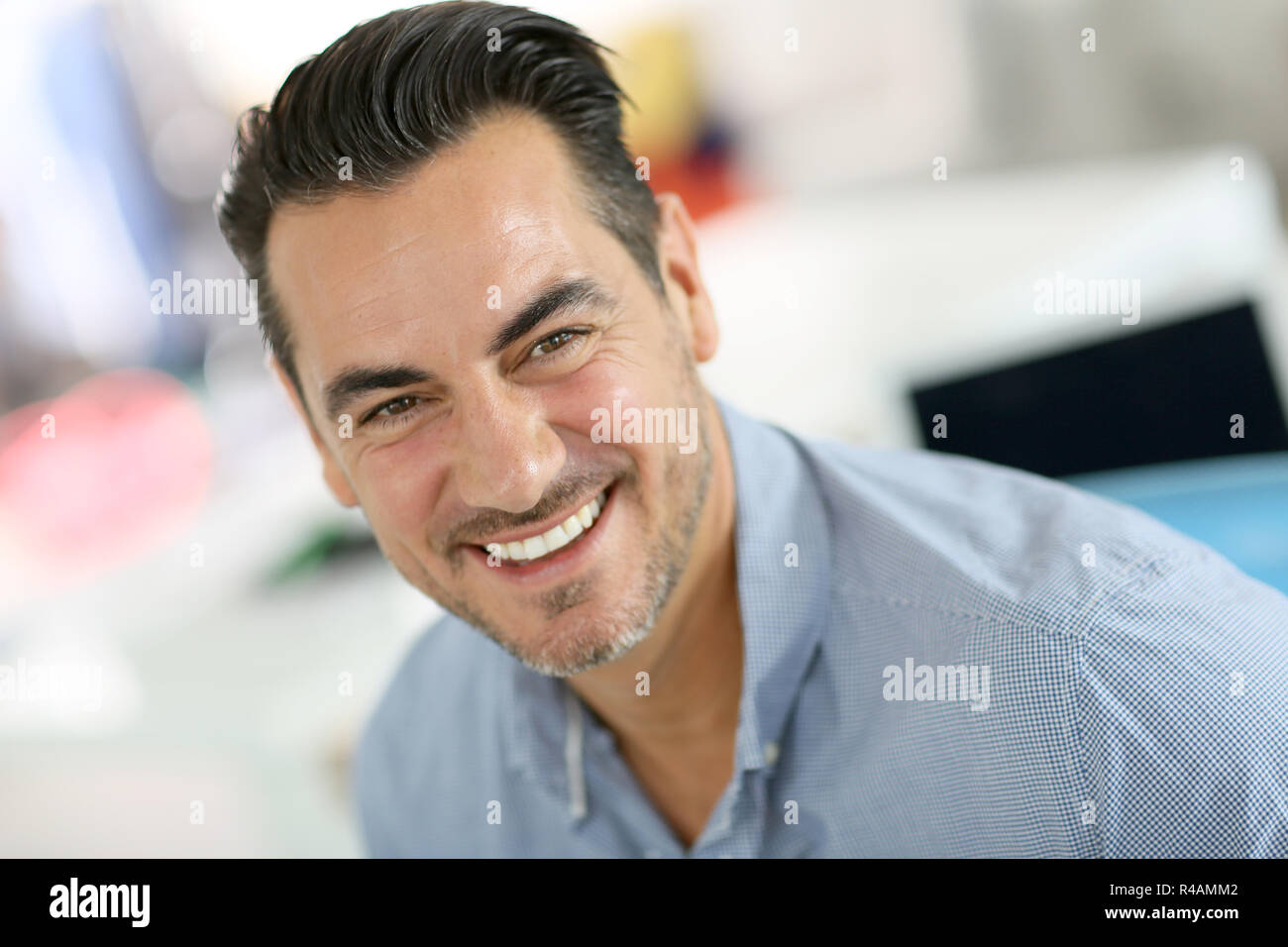 Middleaged worker portrait smiling hi-res stock photography and images - Alamy