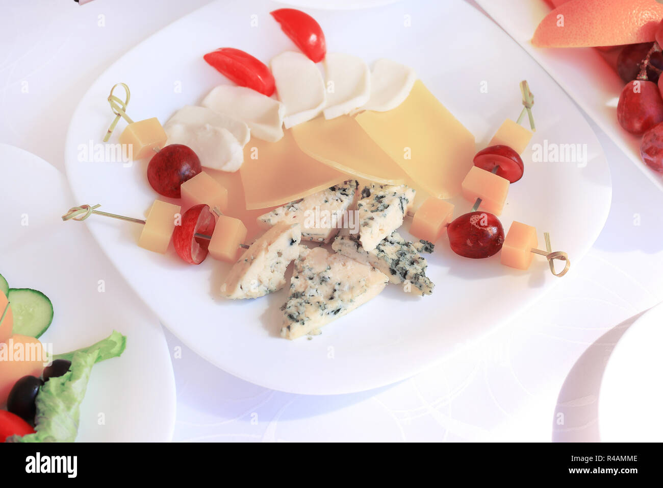 catering table set service with silverware and glass stemware at ...