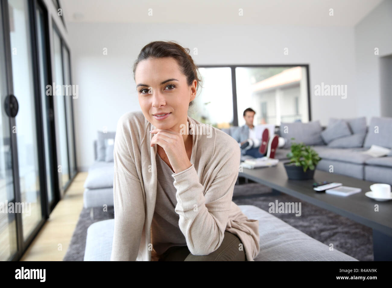 Portrait of beautiful woman relaxing at home Stock Photo - Alamy