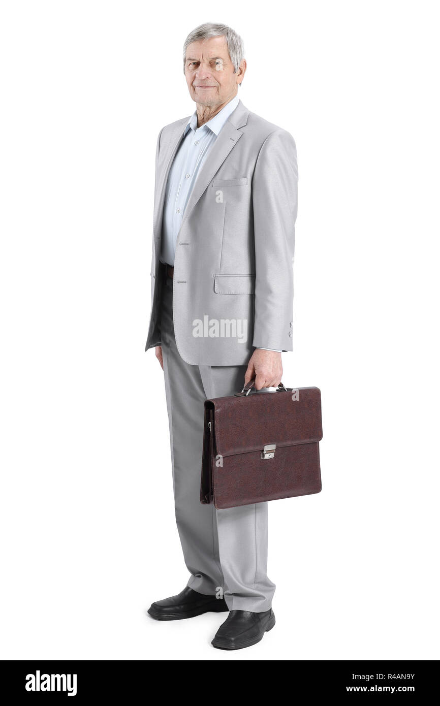 full-length portrait. a successful businessman with a leather briefcase ...