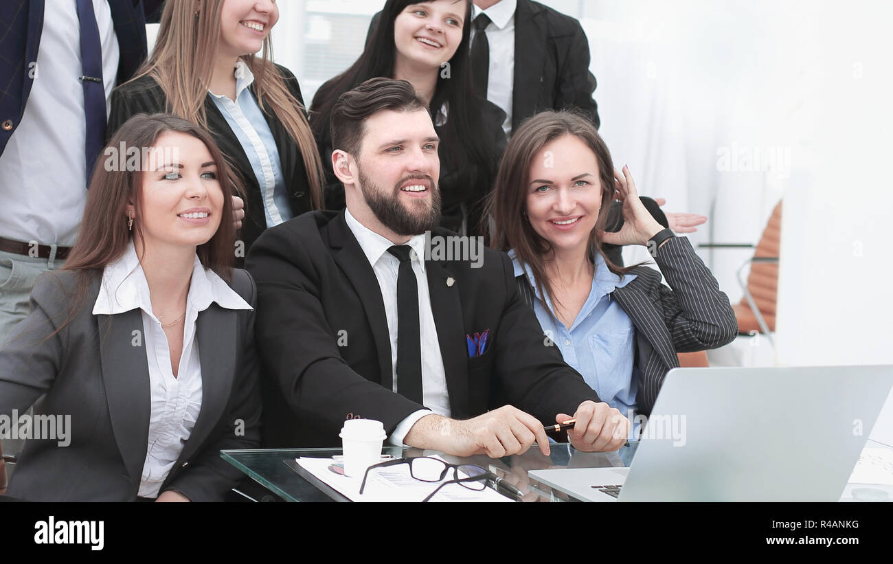 business team with their hands up and voting for decision-making near ...