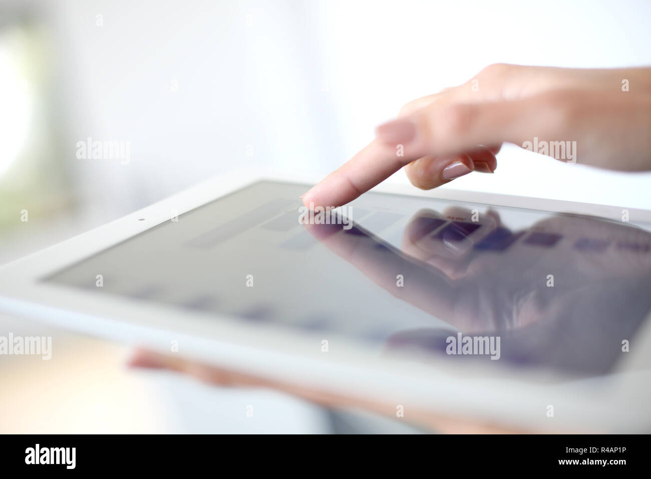 Closeup hand sliding on digital hi-res stock photography and images - Alamy