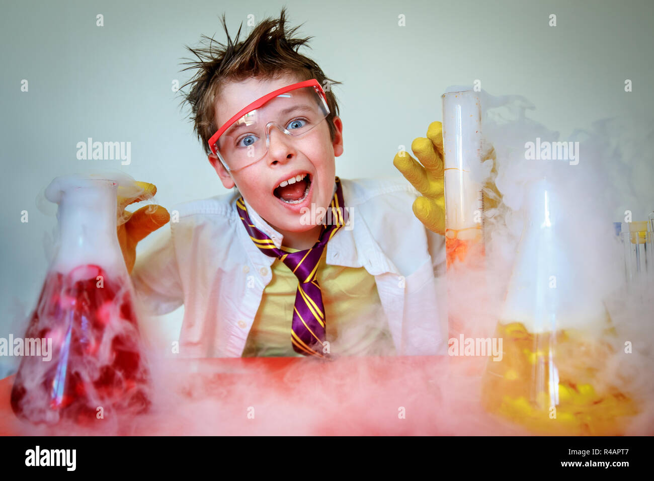 Crazy scientist performing experiments in lab Stock Photo - Alamy