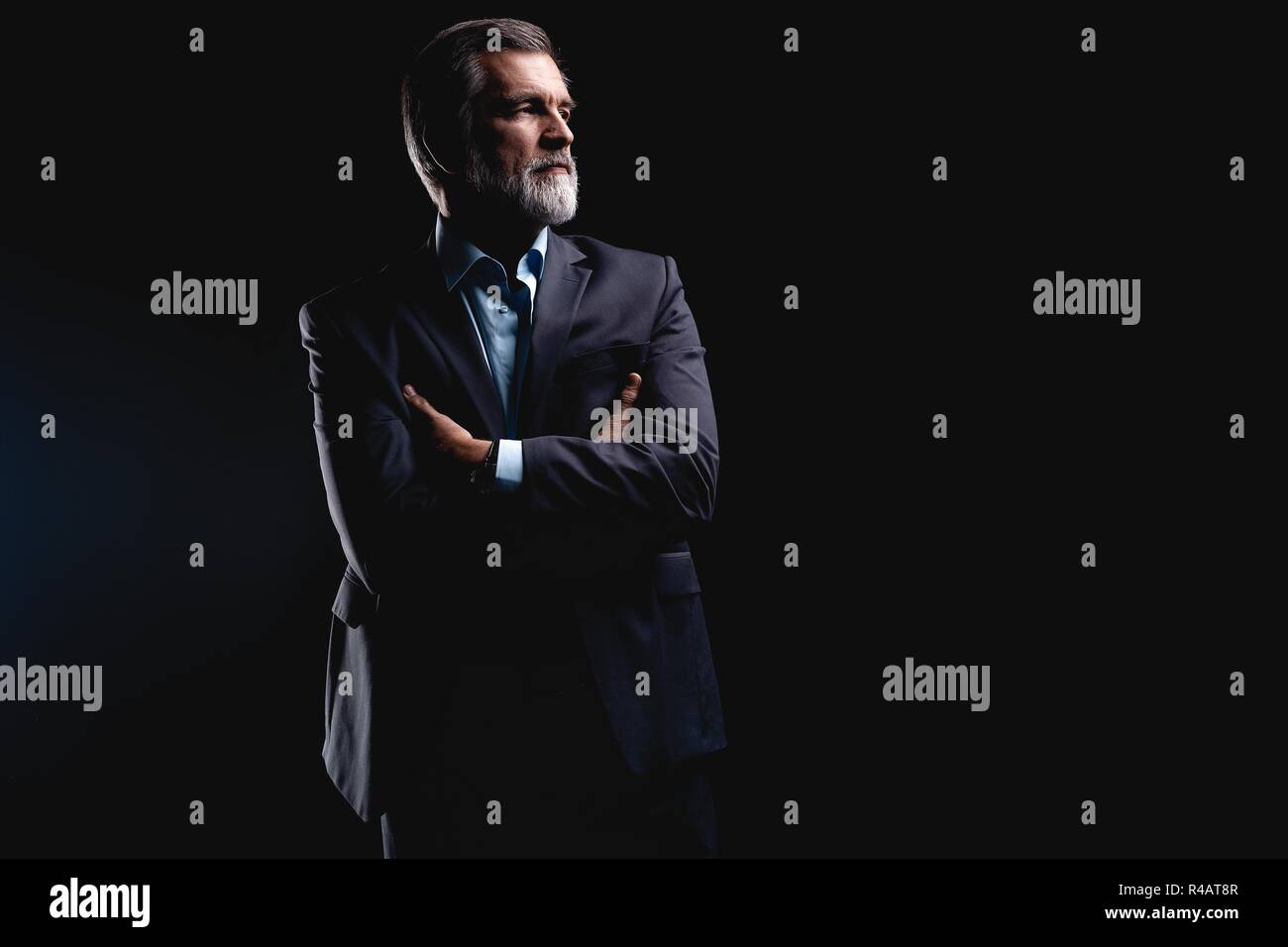 Handsome mature business man isolated on black background Stock Photo ... Handsome mature business man isolated on black background Stock Photo ...