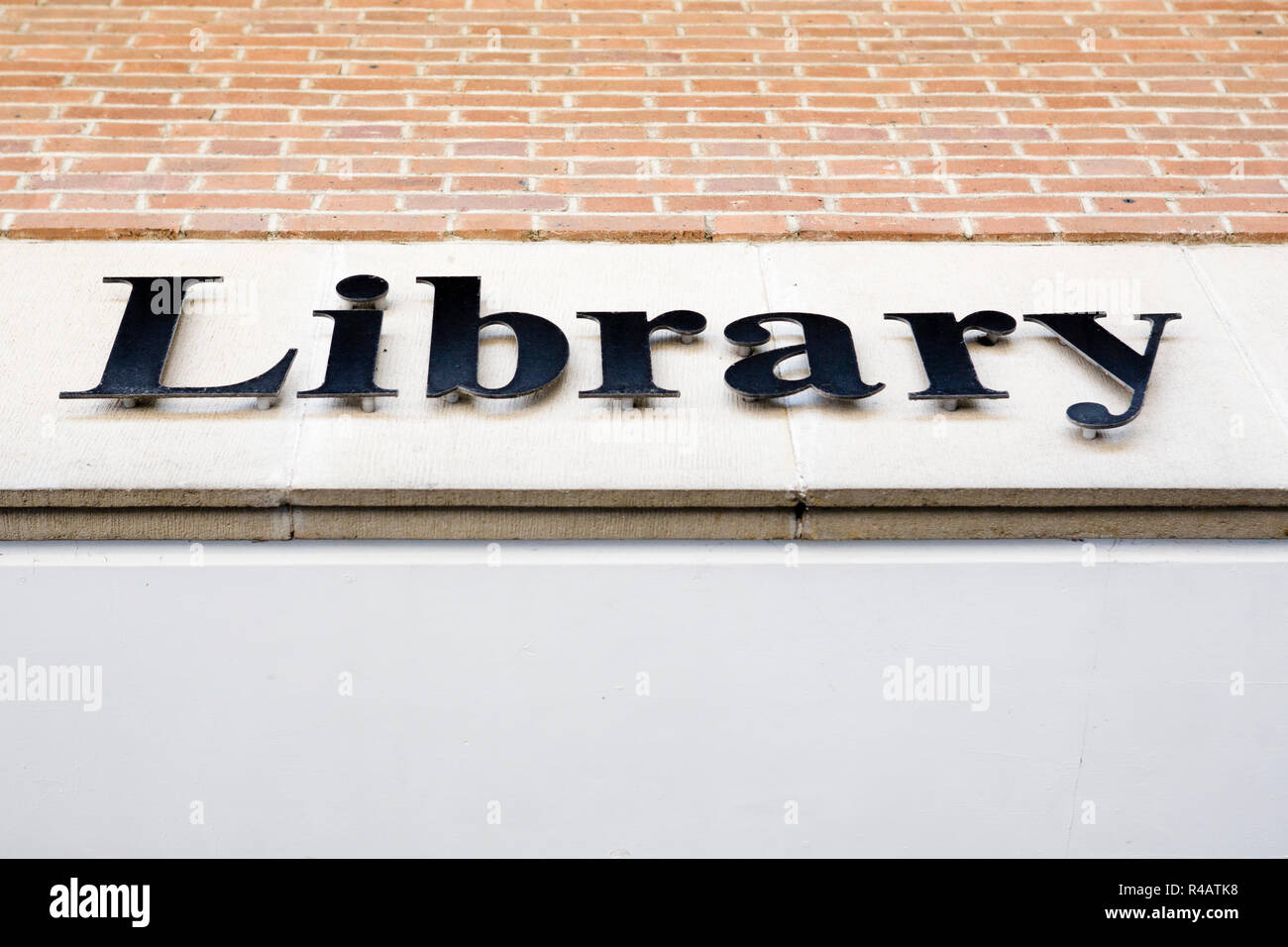 Sign on a wall for a library Stock Photo - Alamy