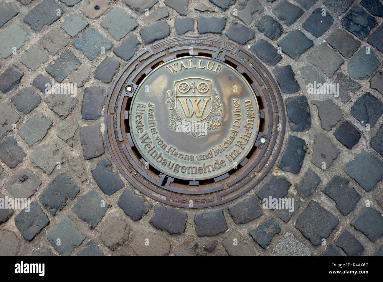 Manhole cover, Walluf, Hesse, Germany Stock Photo - Alamy