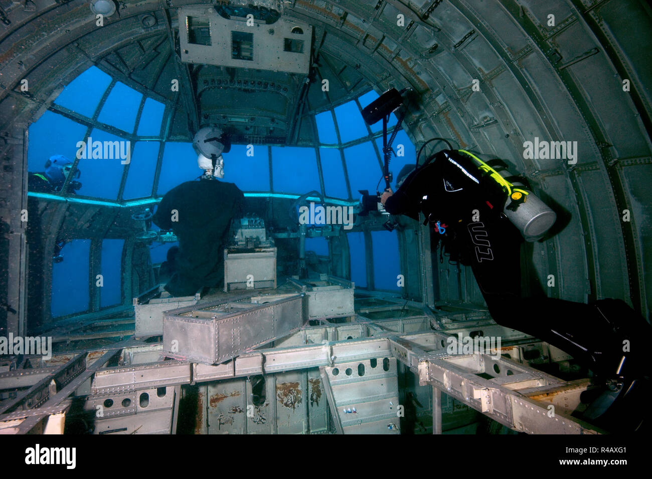 plane scuttled for divers, pilot puppet, taking underwater photos, C130 ...