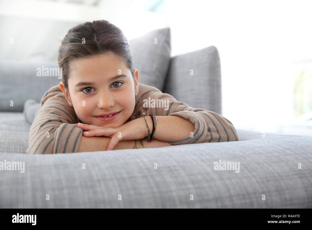 Portrait of smiling 8-year-old girl Stock Photo - Alamy