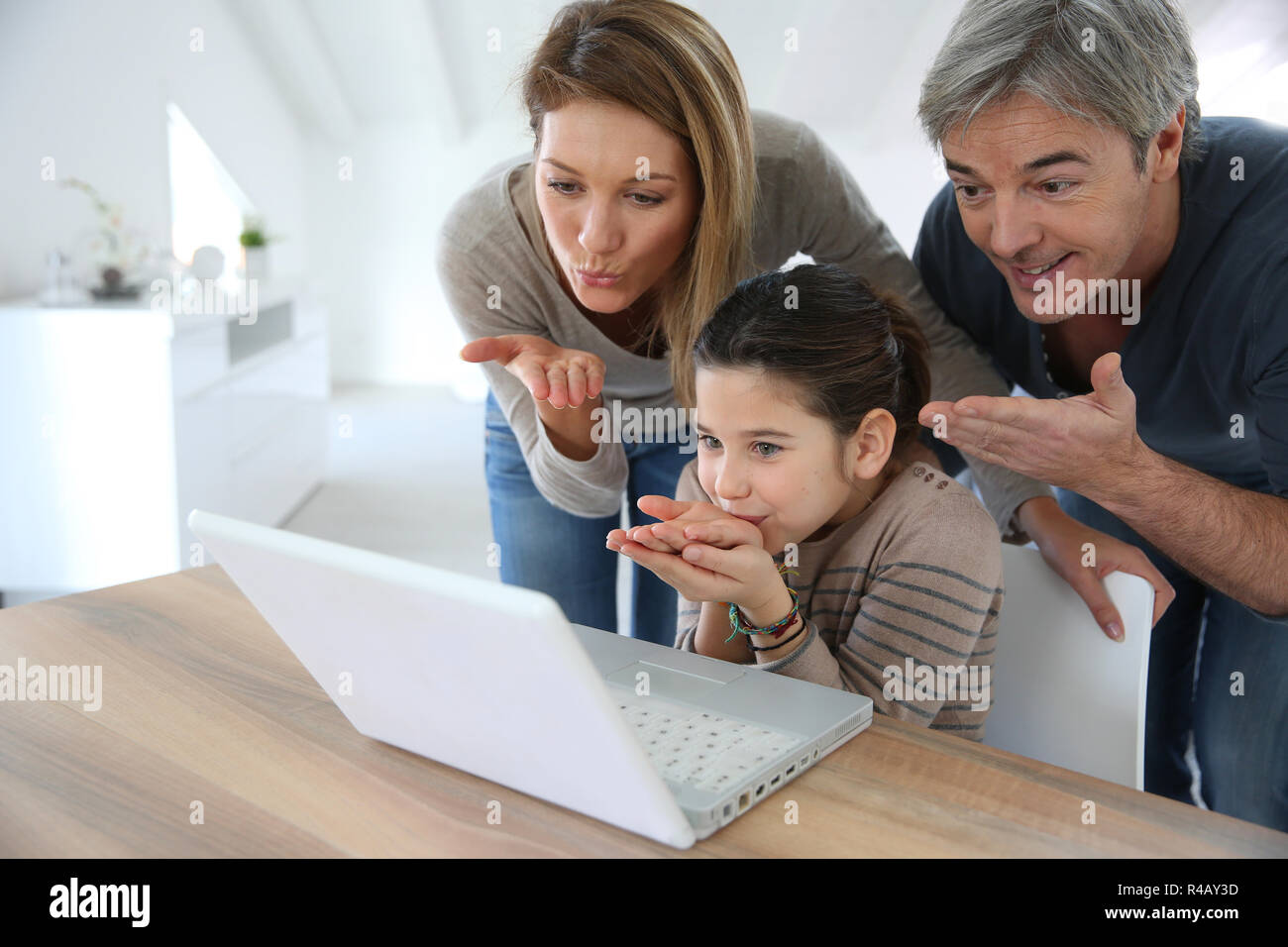 Distant child and parents hi-res stock photography and images - Alamy
