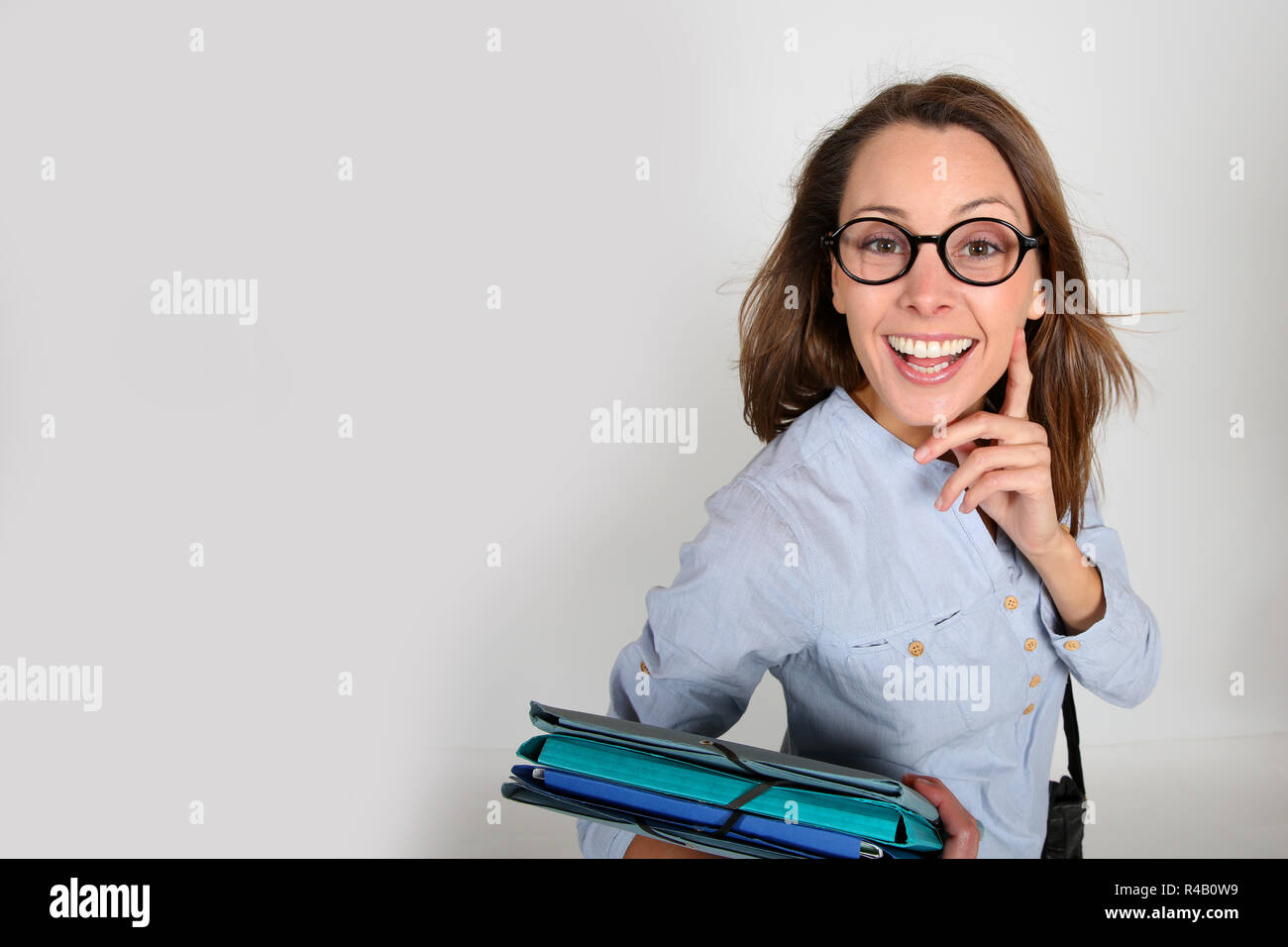 Cute brunette woman wearing eyeglasses hi-res stock photography and images - Alamy