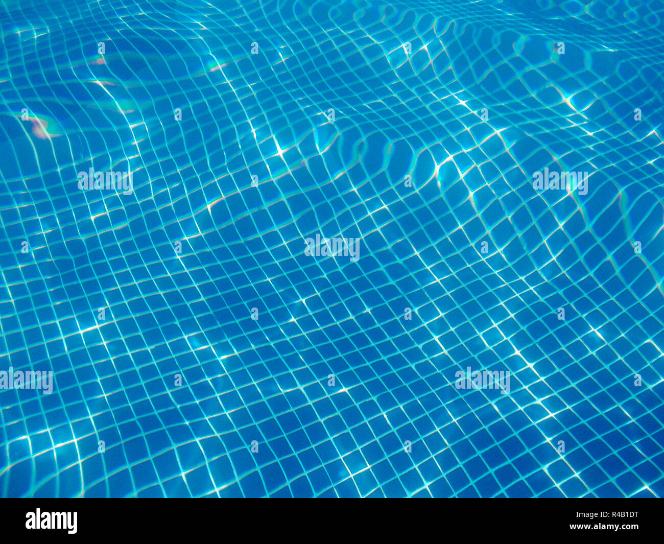 Water reflections on a swimming pool. Underwater photography ...