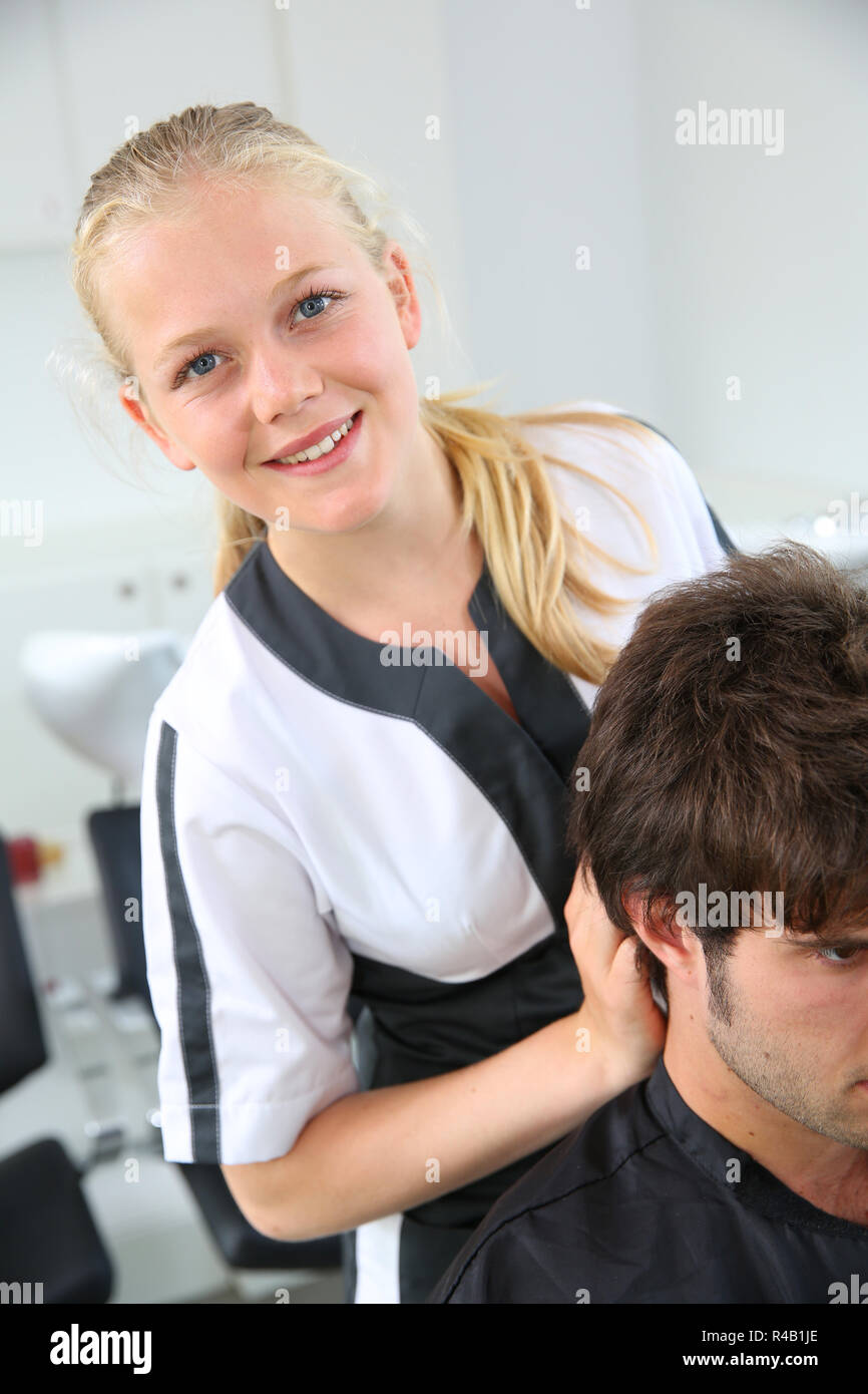 Portrait of hairdressing student girl in hair salon Stock Photo - Alamy