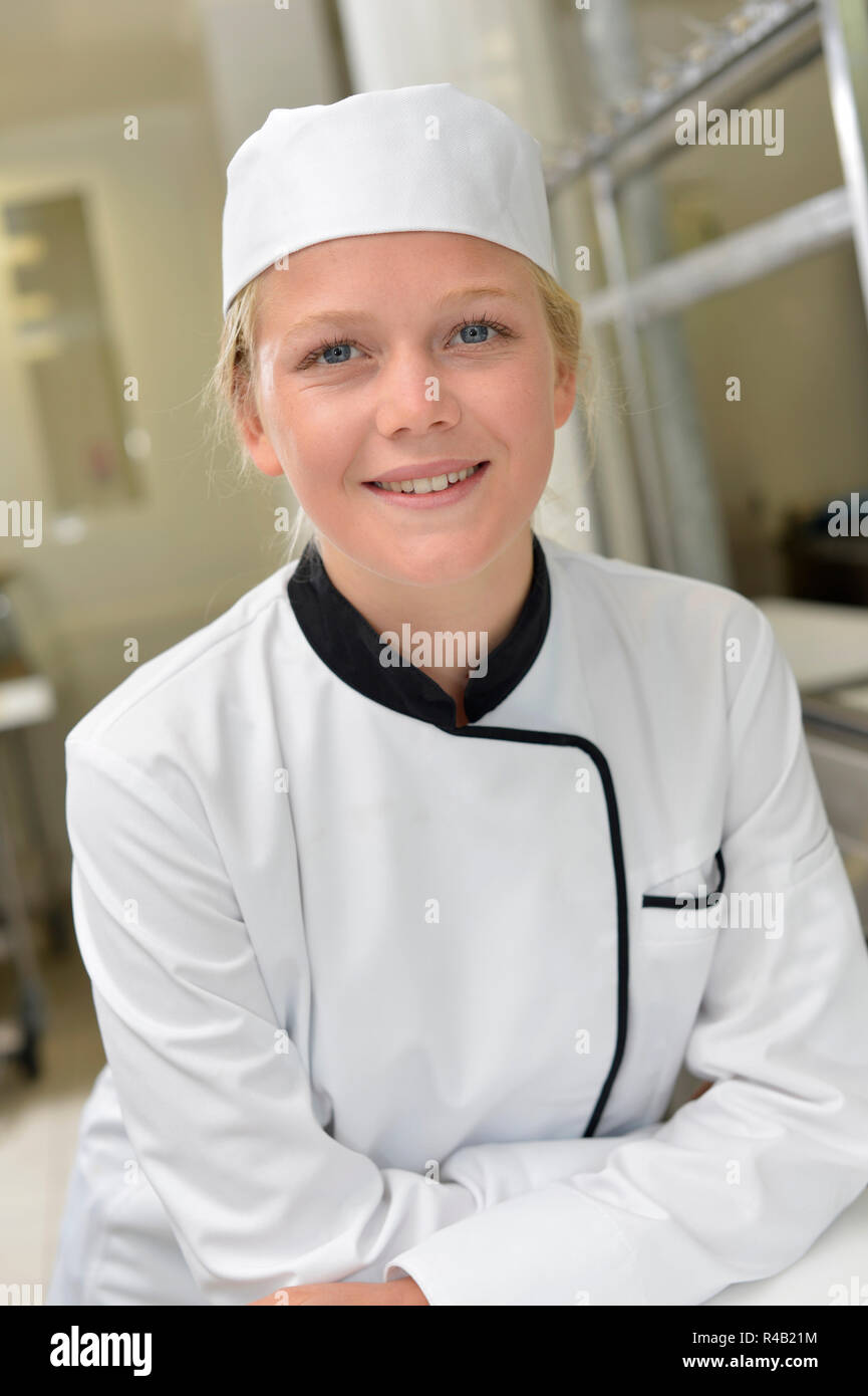 Catering school girl in restaurant kitchen Stock Photo - Alamy