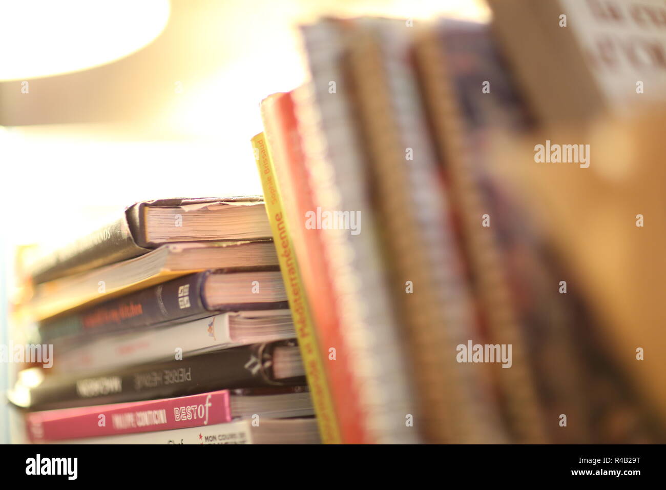 Cooking books set on kitchen shelf Stock Photo - Alamy