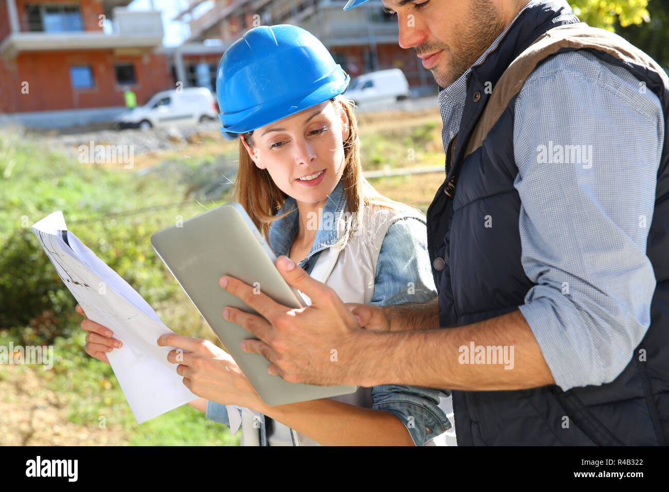 Construction people at work Stock Photo - Alamy
